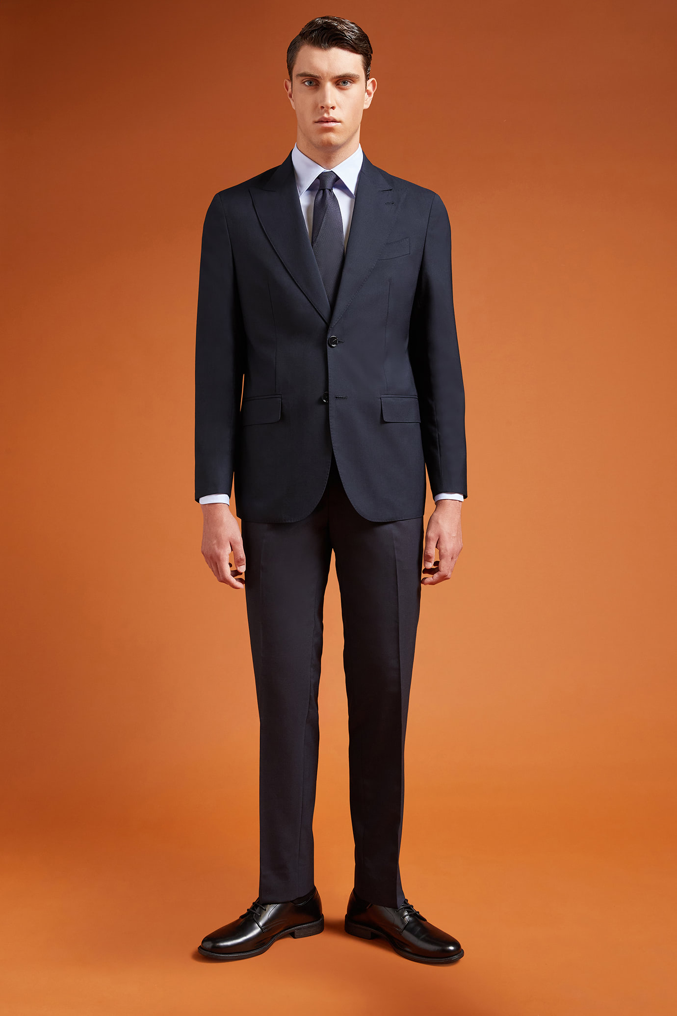 Men's regular fit single-breasted suit featuring a jacket with peak ...